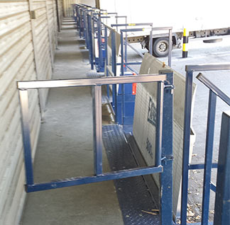 Loading dock railing and gravitational gates