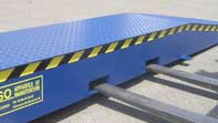 Steel wheel risers with forklift pockets